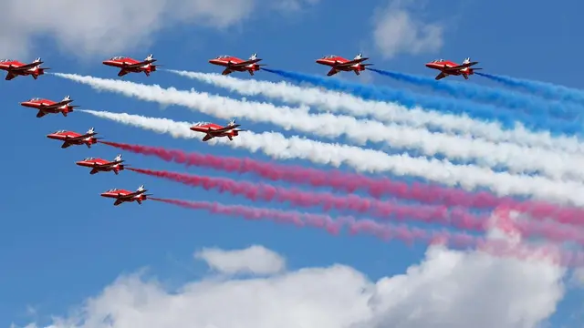 The Royal Air Force Red Arrows Aerobatic Demonstration Team conducts ...