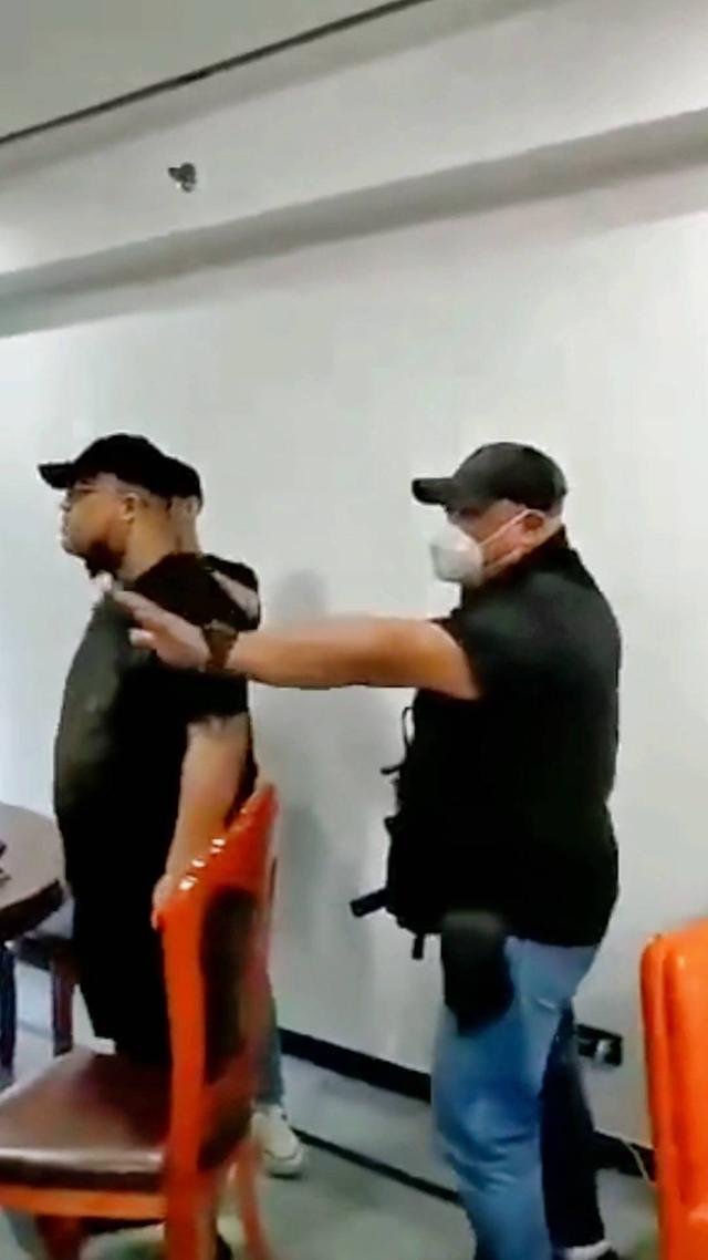 In the video, two Chinese citizens, one named Zhang Xiaolong and the ...