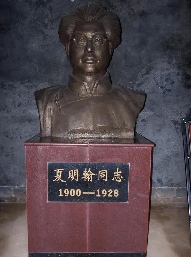 In the main hall, a bronze statue of a young male with a gentle face ...